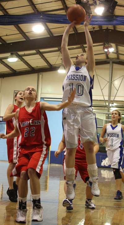 On the bleachers: Photos from Mission's basketball games tonight