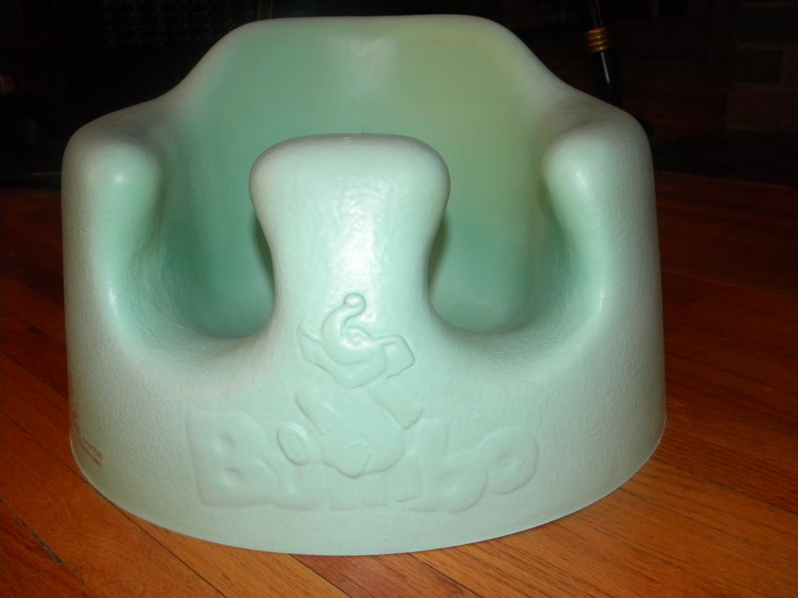 Minneapolis Virtual Garage Sale: Green Bumbo Seat - $20