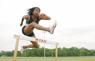 [at a glimpse]: Spts - Archbishop Ryan Track - Tamisha Thomas