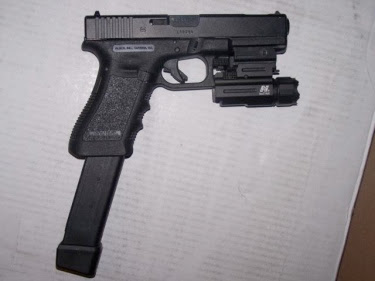 New Guns Gallery: Glock 22, 40 Caliber with 40 Round Magazine and Laser ...