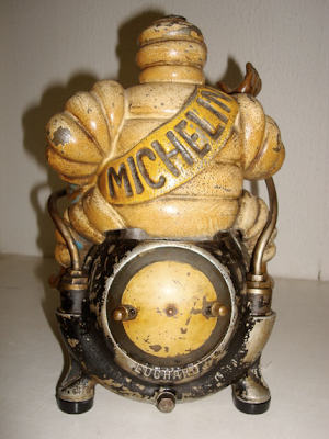 Anonymous Works: 1920's Michelin Man Cast-Iron Air Compressor