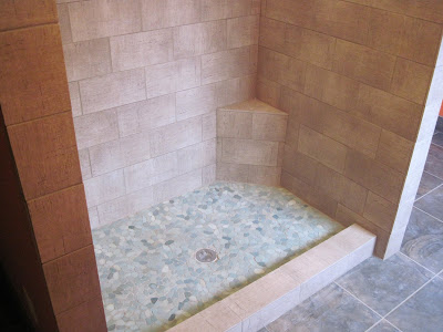 Drennon's Custom Tile: Custom shower with pebble floor Brick pattern walls