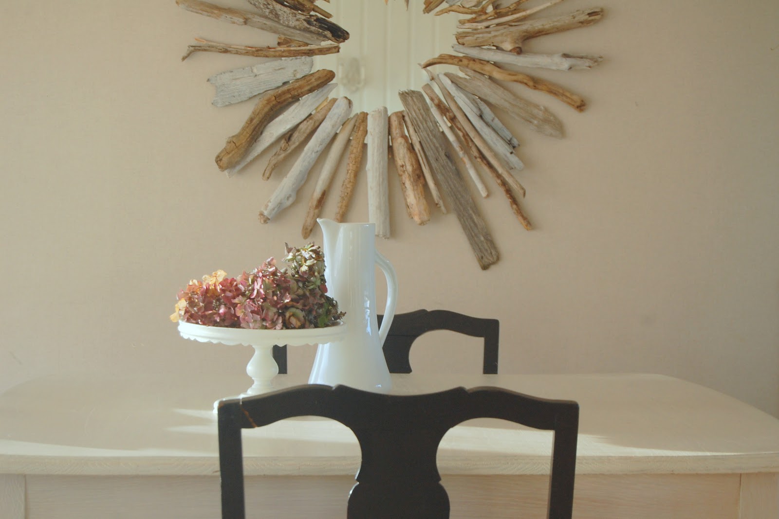 WHITE AS LINEN: sunburst mirror
