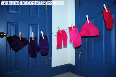 Dramatic Play: Hanging up Clothes