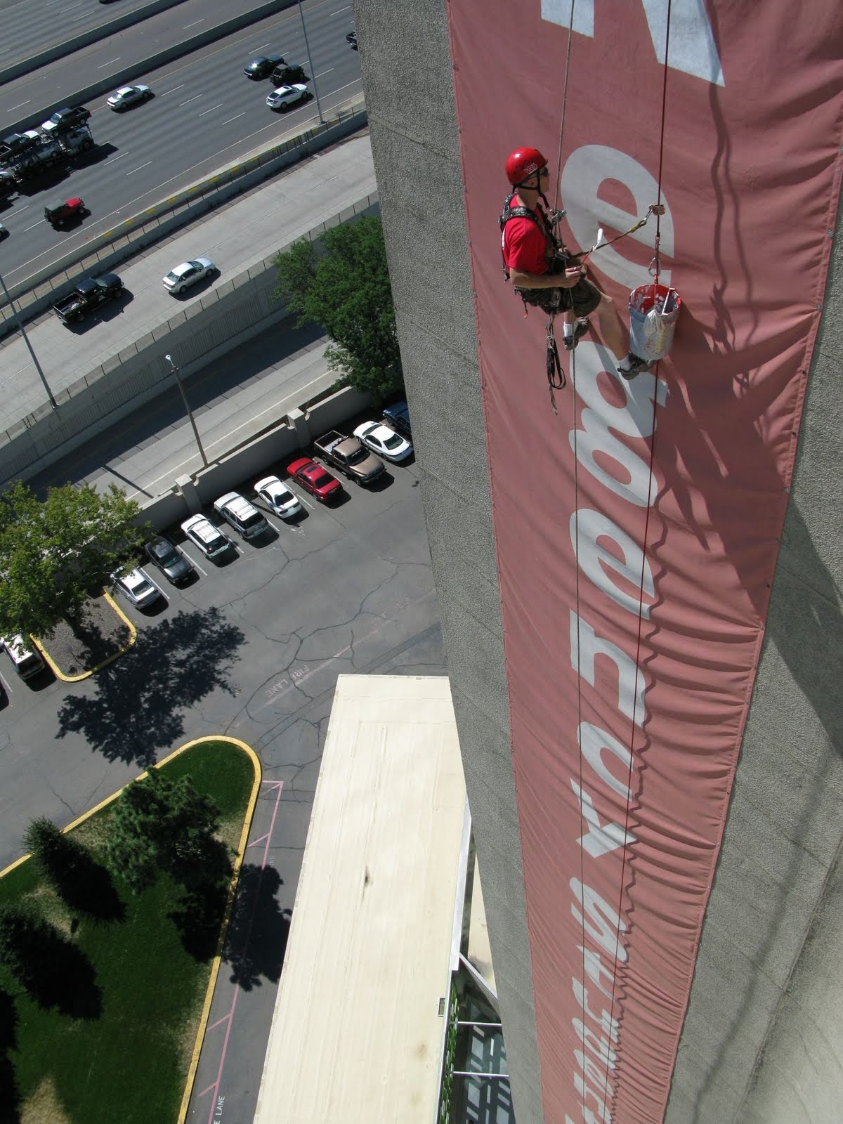 BASE Painters: High Rise Banner and Sign Painting