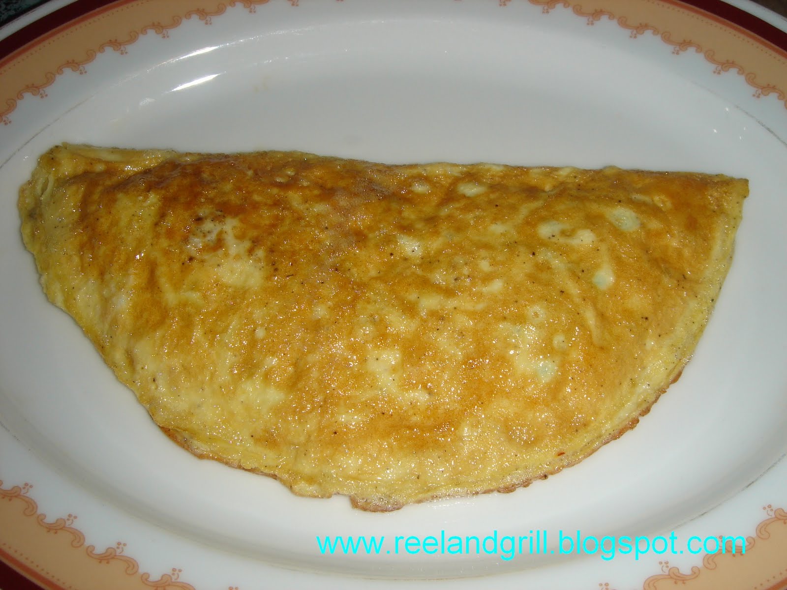 Reel and Grill: Tomato and Cheese Omelette