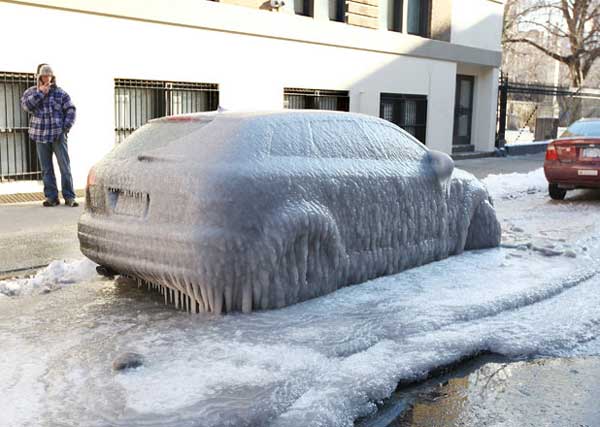 Nothing To Do With Arbroath: Water main break leaves car covered in ice