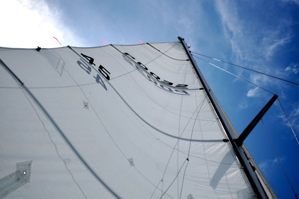 Sail Delmarva: Carbon fiber, tapered battens, and a slack leach.