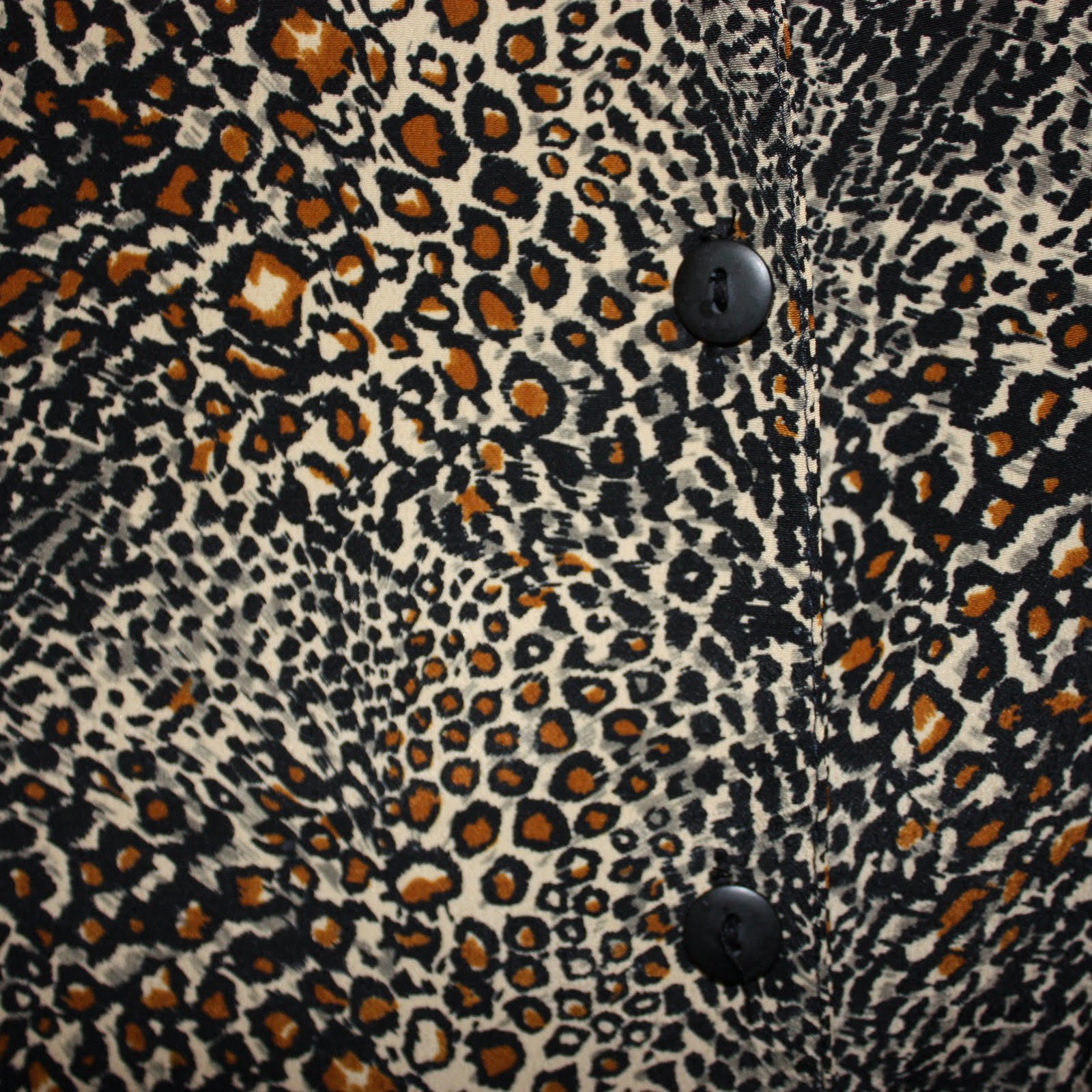 ruby's cube vintage: leopard print long sleeved shirt.