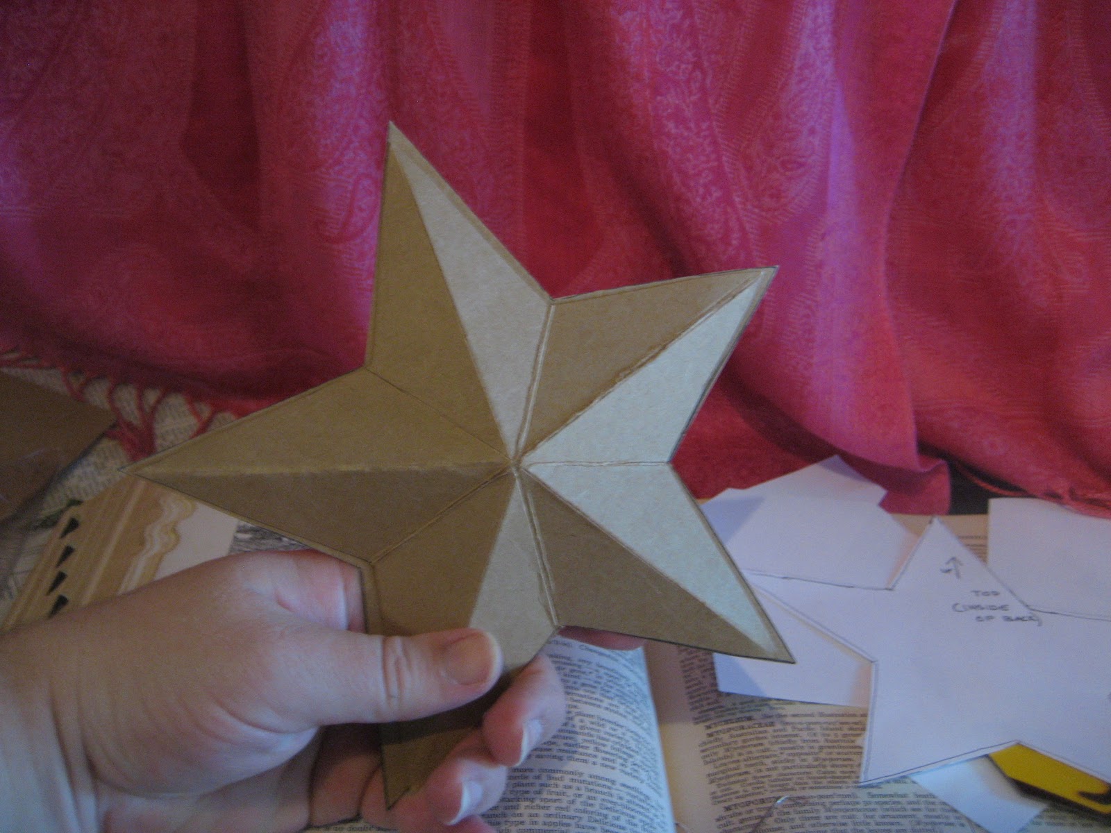 Carefully bend at the score lines, alternating direction at the center ...