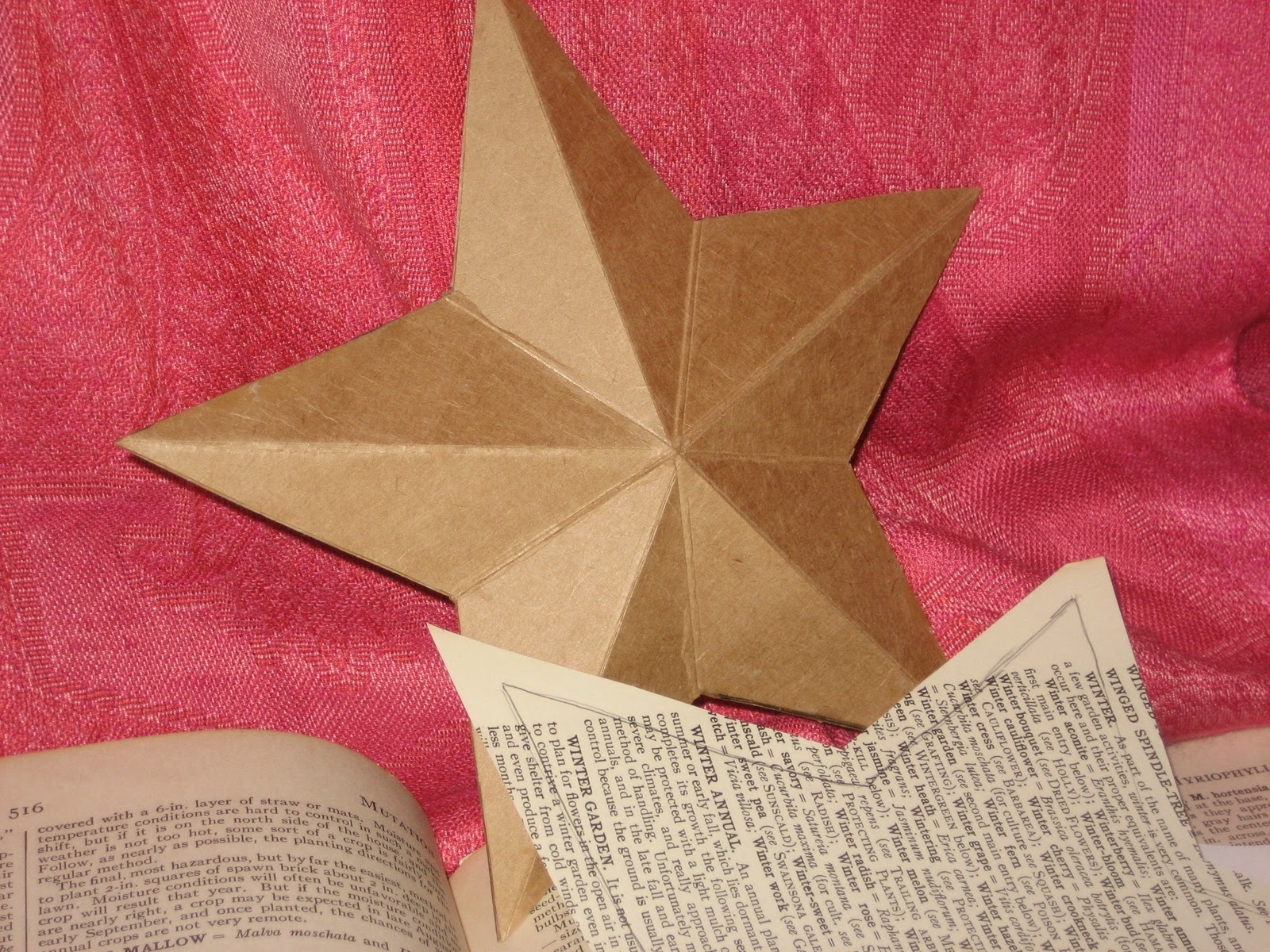 "Precrease" your paper, and adhere it to the cardboard. I used a wet ...