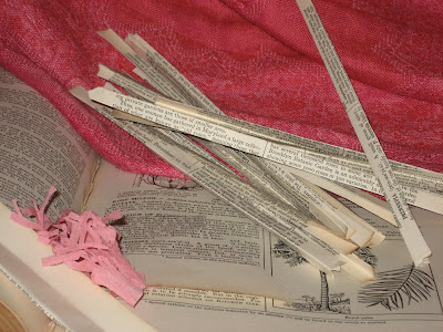 These sections were then cut apart and folded lengthwise into quarters ...