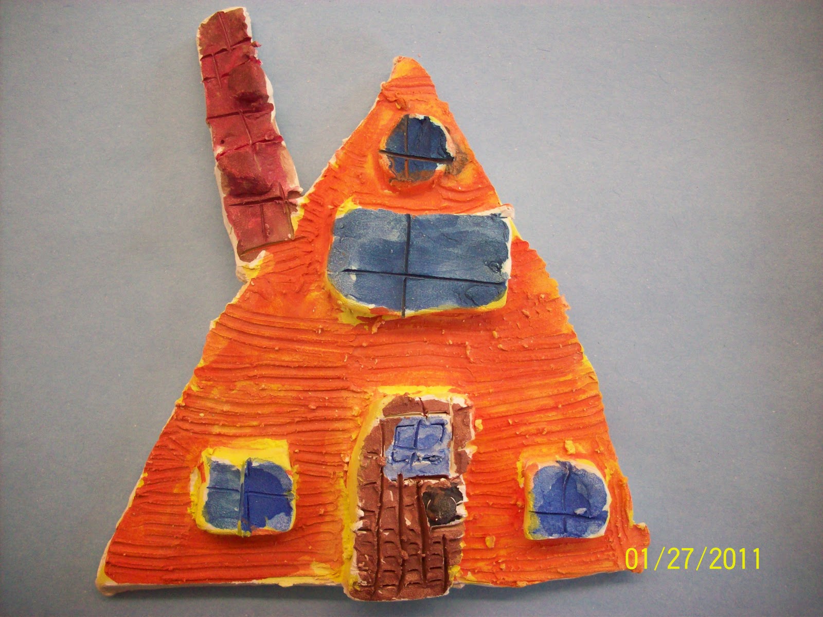 Center School Art: Clay Houses by Grade 4