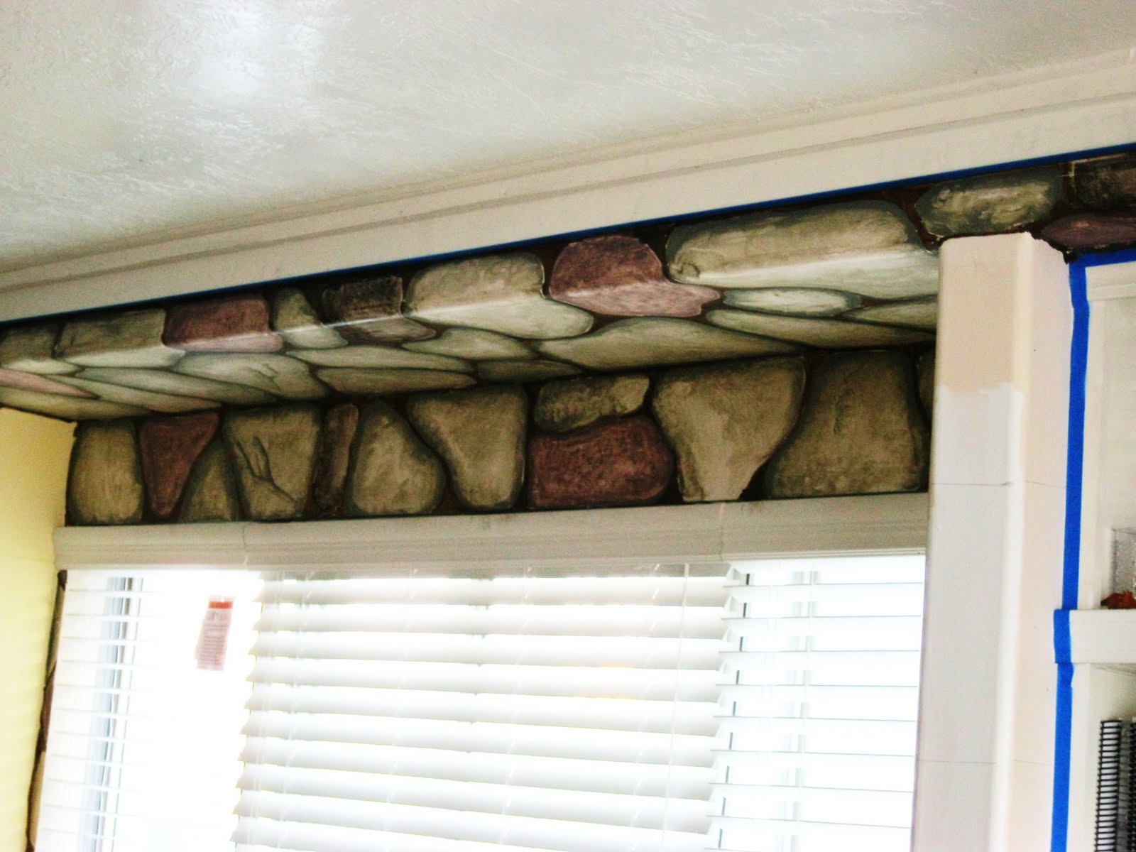 Bawden Fine Murals: Faux painted brick and stone for a castle look.