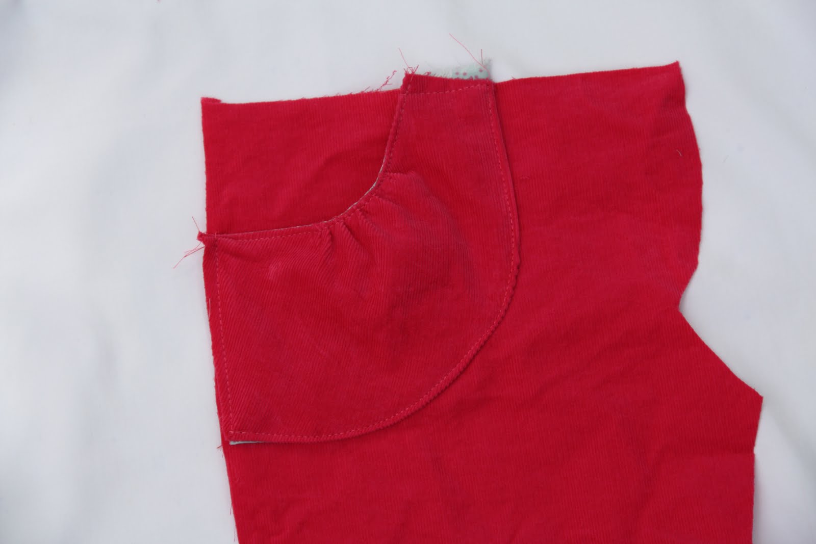 Sew right front piece to right back piece at the outer side edge, right ...