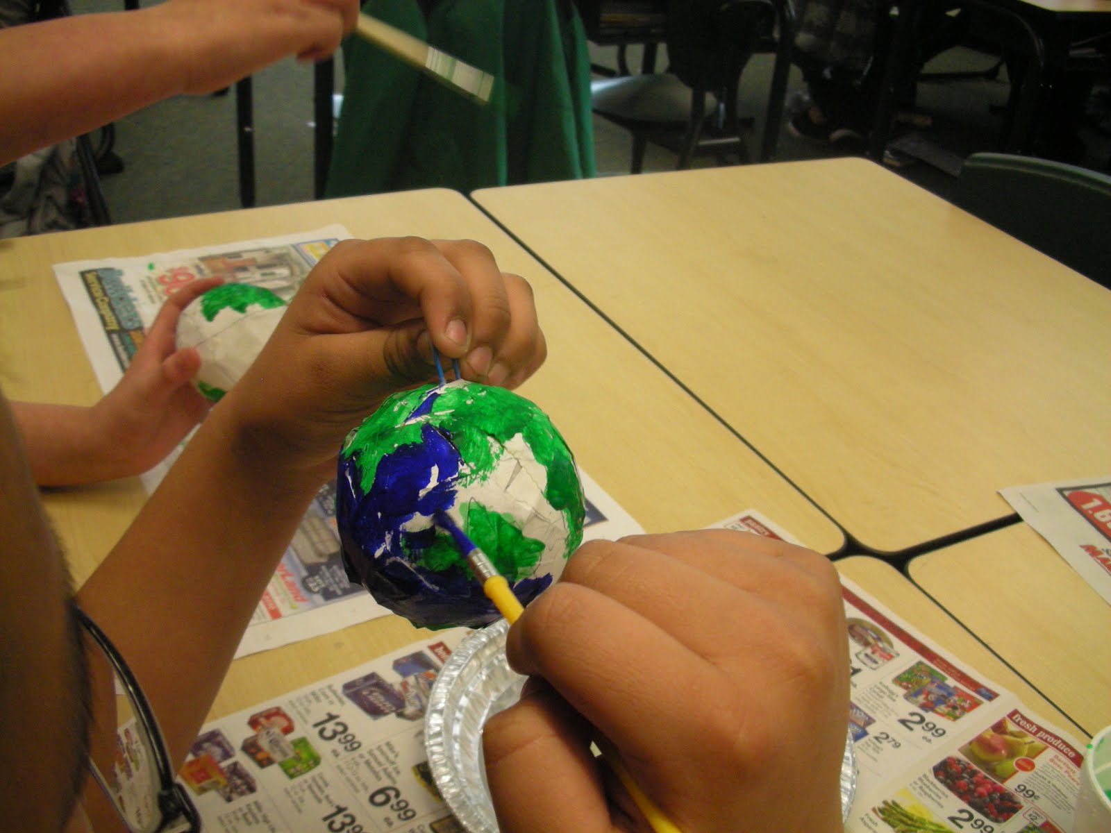 Students rock the Simple Gifts globe project | word.