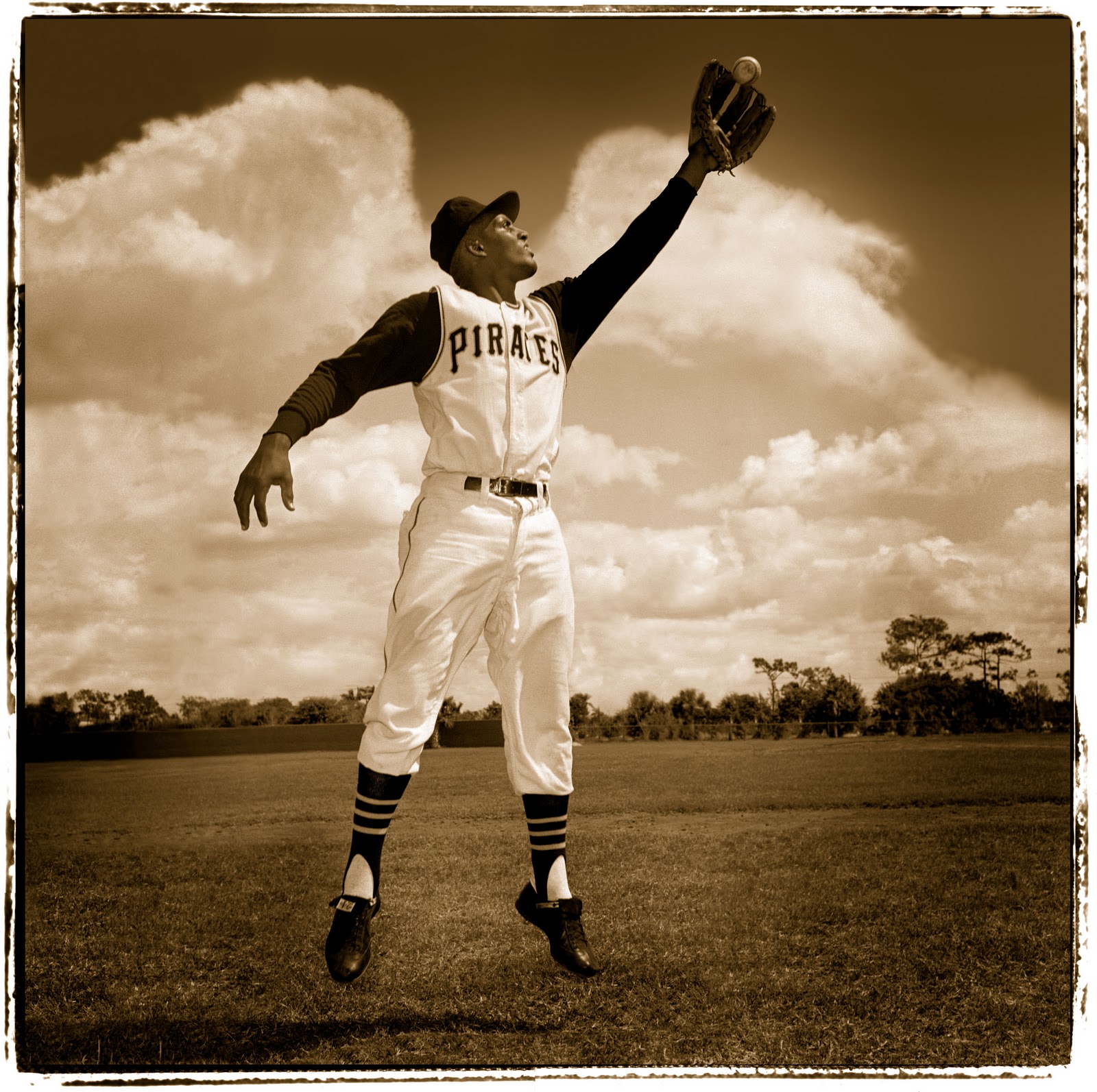 This photo of Clemente with cloud "angel wings" is hanging in the ...