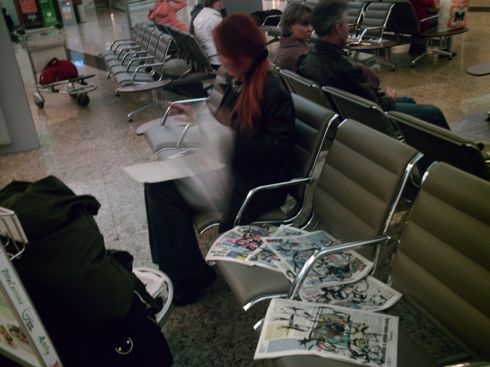 performance of expressive motions paintings on newspaper on public ...