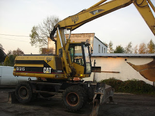 Maszyny Drogowe i Budowlane: Koparka kołowa CAT 315 M