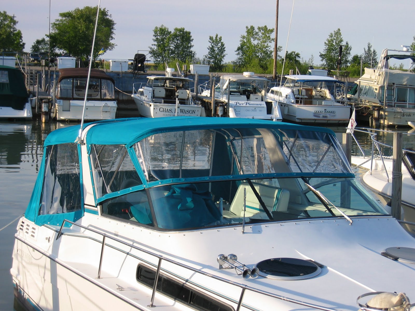 Homestyle Custom Upholstery and Awning: Teal Boat Top at SMYC
