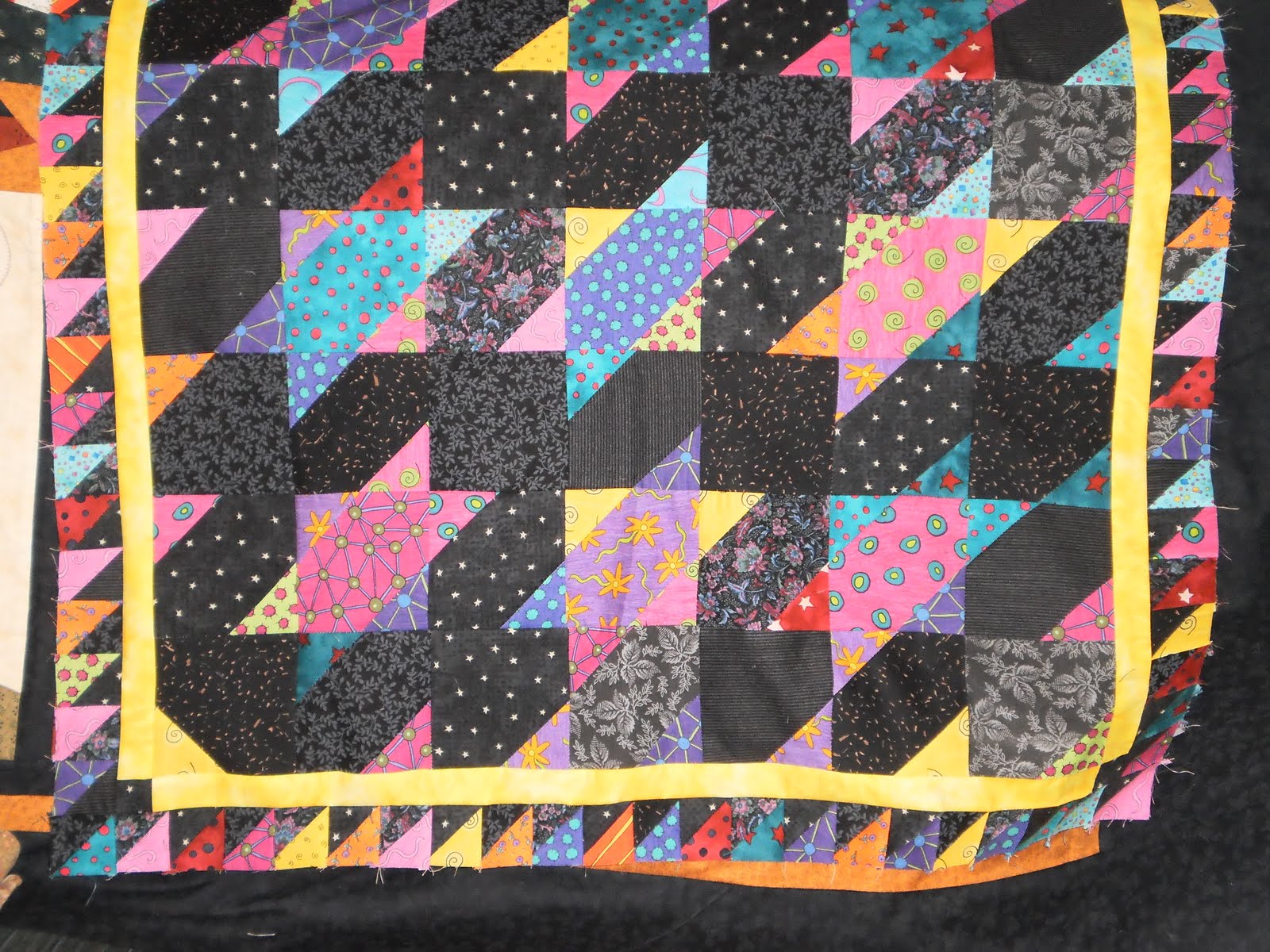 Prairie Hens Quilt Retreat: half square triangle border