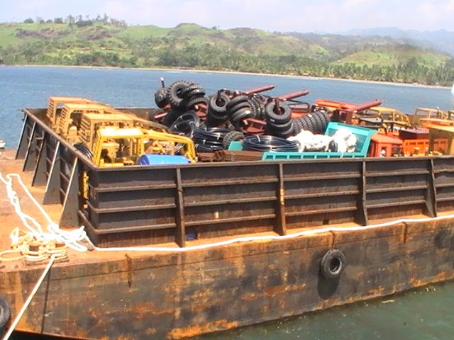 EURALIA PAINE: Pontoons with logging equipment at Oro Bay