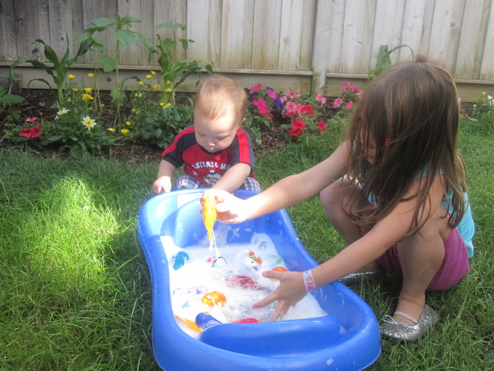 Educated, Common Sense Parenting: Outdoor Activity: Washing Toys!