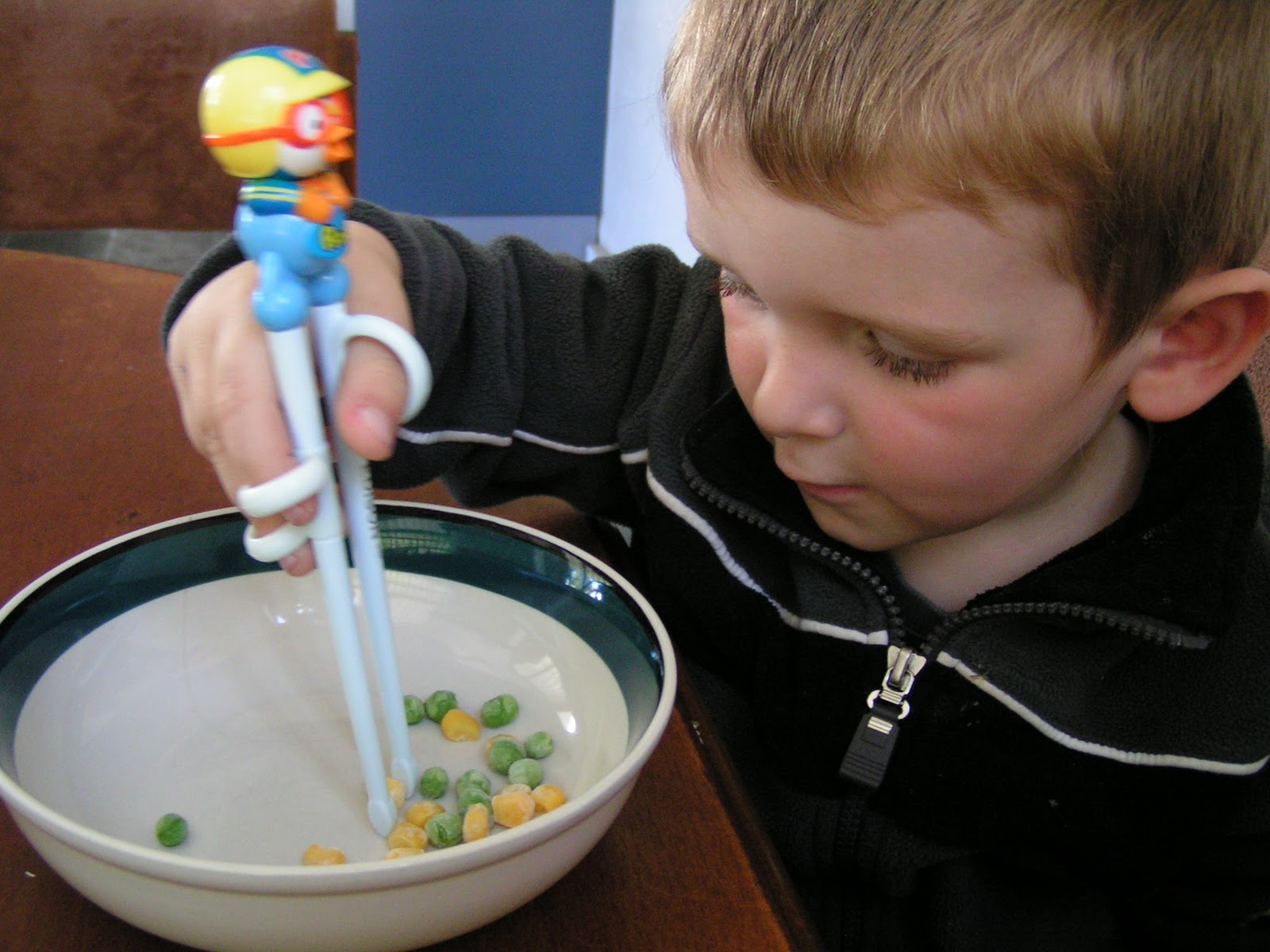 Curious Kai: Playing Chopsticks