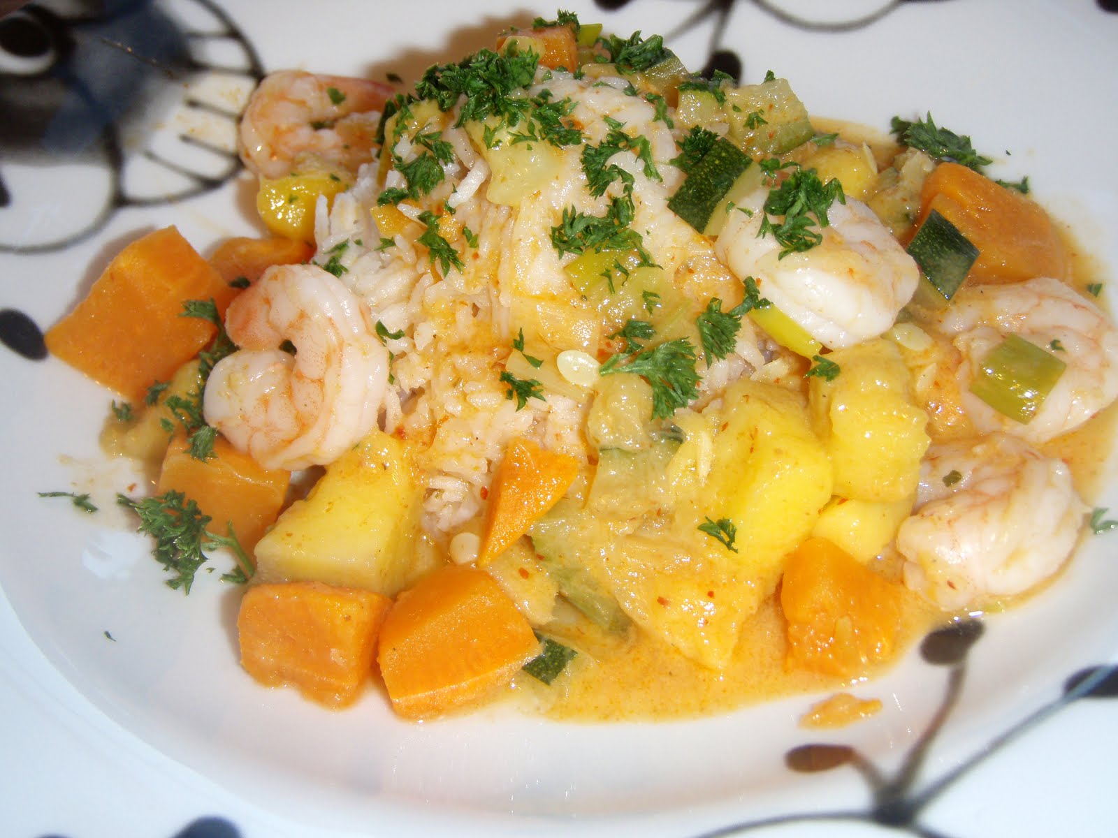 En sida om god mat i allmänhet: Scampi med mango i röd currysås