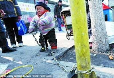 Poverty-stricken Chinese father who shackled his son given three years ...