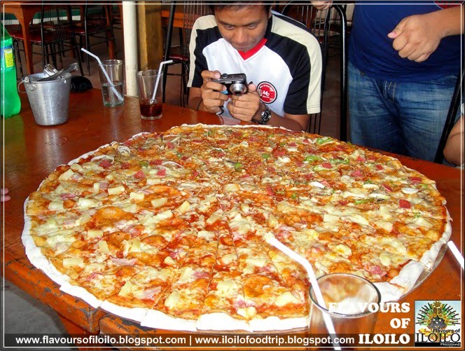 One GIGANTIC pizza to commence one GARGANTUAN task