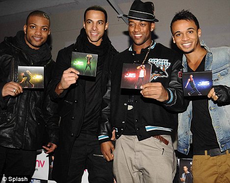 JLS mobbed by hundreds of female fans at Outta This World album signing ...