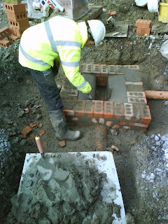 S.C.Jones Brickwork: 17) Benching a manhole