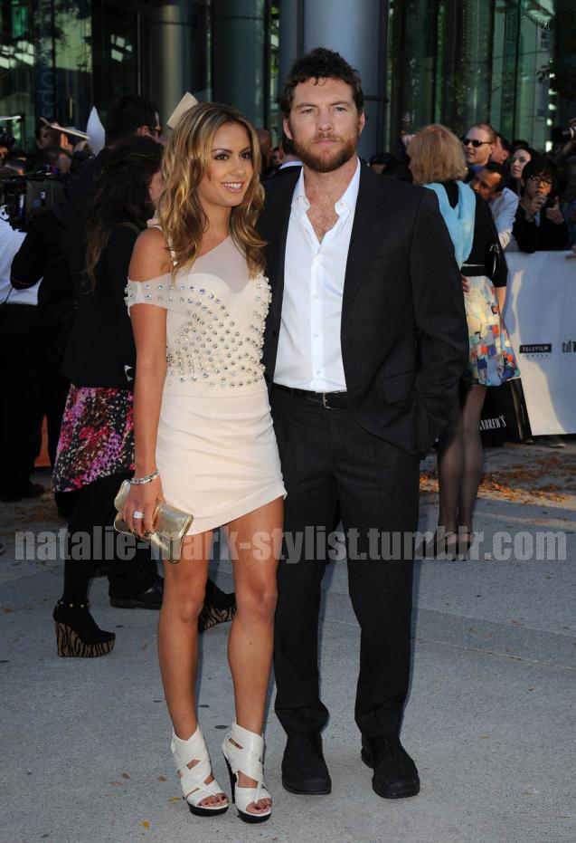 Sam Worthington y Natalie Mark en HQ