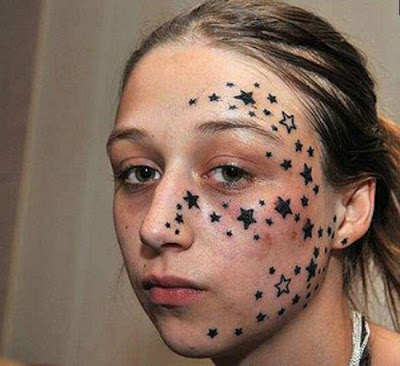A girl has 56 stars instead of 8 stars on her face