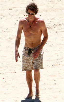 Take That Portugal: Howard Donald shows off amazing body on the beach