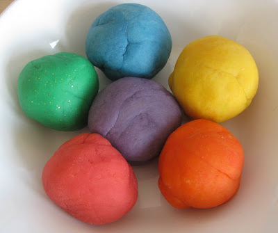 Counting Coconuts: April Sensory Tub & Playdough - Rainbows
