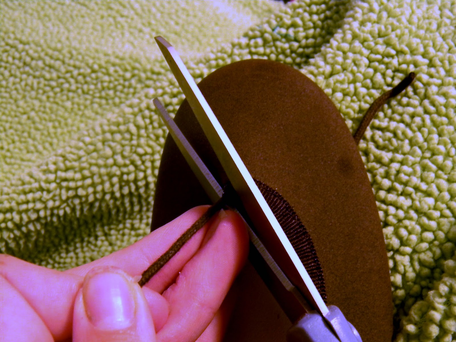 Now, take the bottom part of two snaps (or the part that has the hole ...